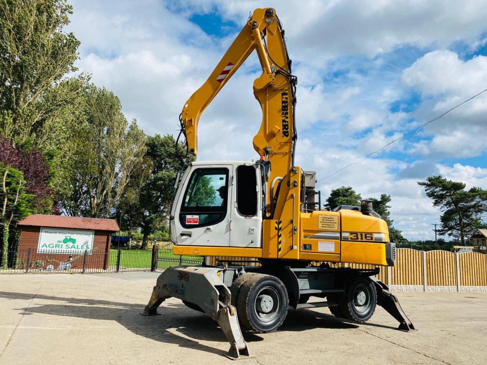 LIEHBERR 316 HIGH RISE CABIN WHEELED MATERIAL HANDLER * YEAR 2010
