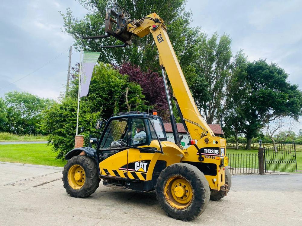 CATERPILLAR TH330B TURBO TELEHANDLER C/W HYDRAULIC QUICK HITCH