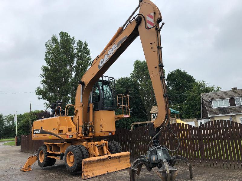 CASE WX210 WHEELED SCRAP HANDLER C/W SELF ROTATING 5 TINE GRAB ( PLEASE ...