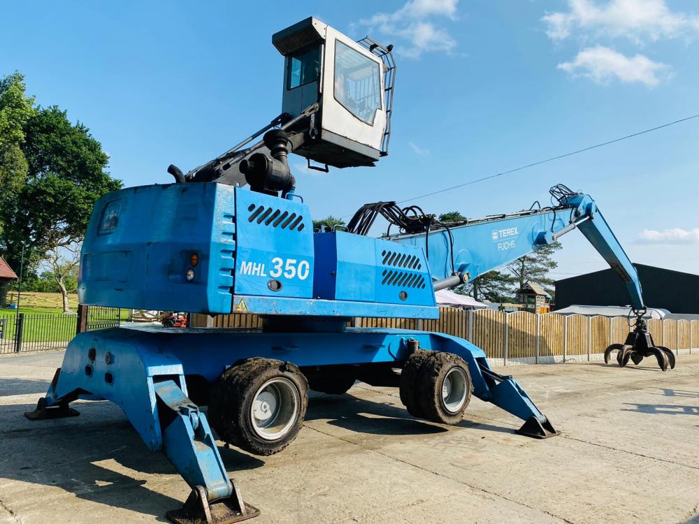 FUCHS MHL350 HIGH RISE CABIN SCRAP HANDLER *YEAR 2009* C/W 5 TINE GRAB ...