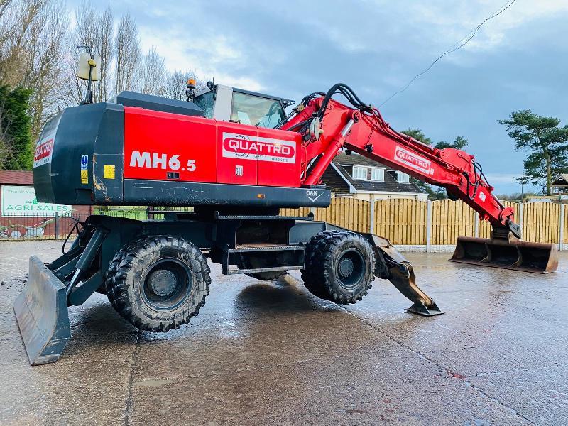 O&K MH6.5 WHEELED EXCAVATOR C/W BLADE & QUICK HITCH