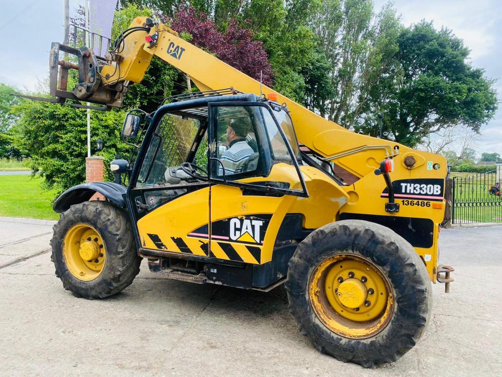 CATERPILLAR TH330B TURBO TELEHANDLER C/W HYDRAULIC QUICK HITCH