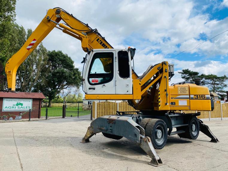 LIEHBERR 316 HIGH RISE CABIN WHEELED MATERIAL HANDLER * YEAR 2010