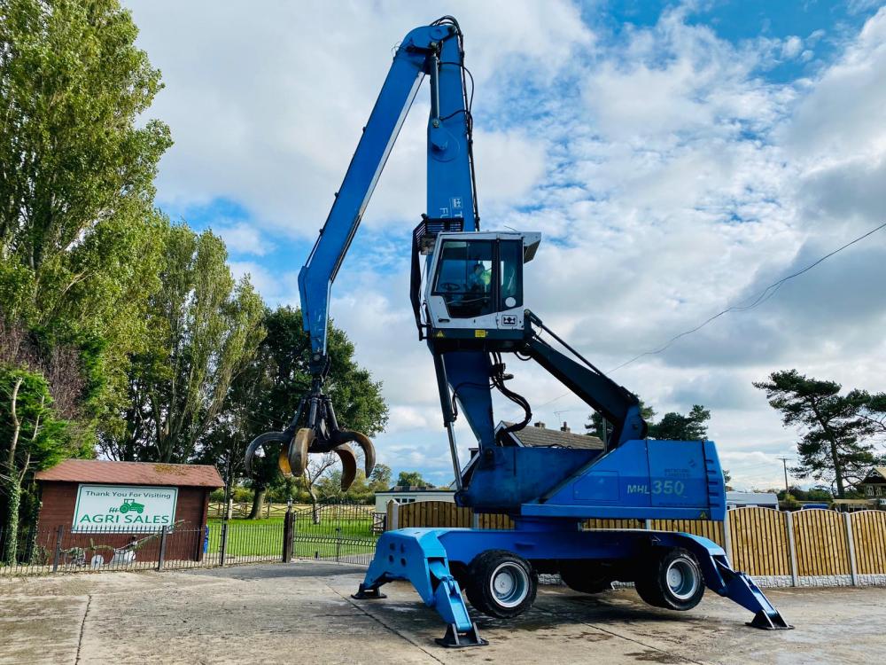 FUCHS MHL350 HIGH RISE CABIN SCRAP HANDLER *YEAR 2009* C/W 5 TINE GRAB