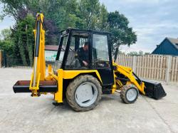 LEWIS BADGER 4WD BACKHOE DIGGER C/W THREE IN ONE BUCKET ( ENGINE SMOKES )
